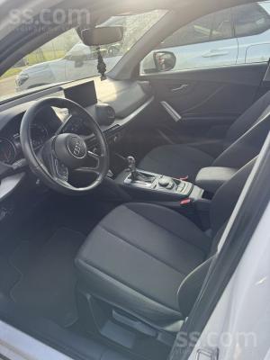 White Audi Q2 2018 in Riga, with an engine capacity of 1.40 L and mileage of 170 thousand km for 12300 €, photo 13 on AUTOMOTO.COM.LV