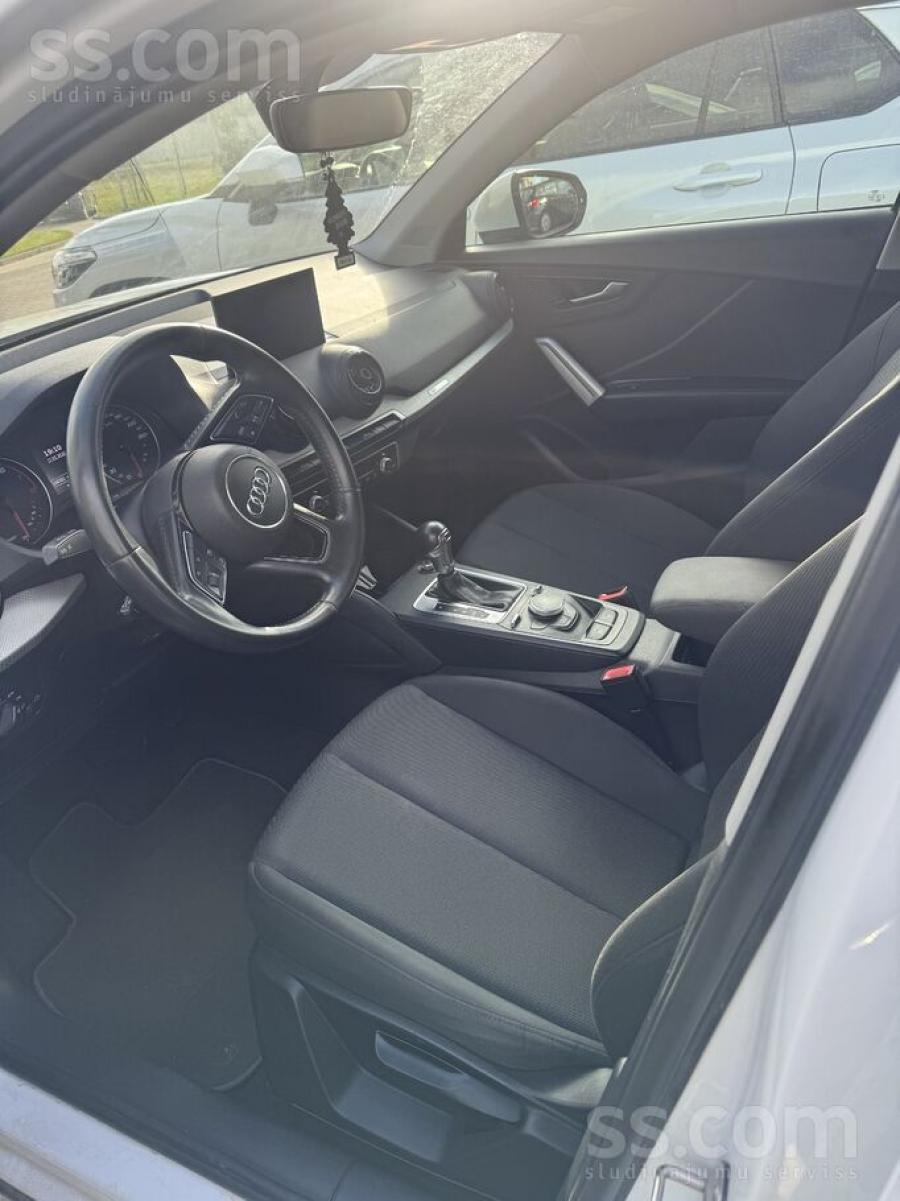 White Audi Q2 2018 in Riga, with an engine capacity of 1.40 L and mileage of 170 thousand km for 12300 €, photo 13 on AUTOMOTO.COM.LV