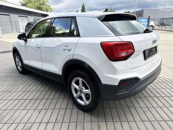 White Audi Q2 2021 in Kaunas, with an engine capacity of 2.00 L and mileage of 138 thousand km for 17900 €, photo 4 on AUTOMOTO.COM.LV