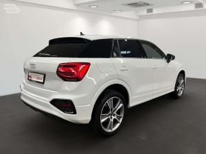 White Audi Q2 2022 in Kaunas, with an engine capacity of 1.00 L and mileage of 62 thousand km for 23458 €, photo 5 on AUTOMOTO.COM.LV