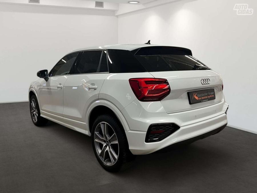 White Audi Q2 2022 in Kaunas, with an engine capacity of 1.00 L and mileage of 62 thousand km for 23458 €, photo 6 on AUTOMOTO.COM.LV