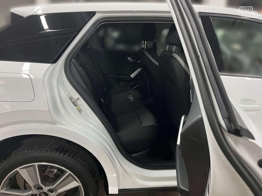 White Audi Q2 2022 in Kaunas, with an engine capacity of 1.00 L and mileage of 62 thousand km for 23458 €, photo 14 on AUTOMOTO.COM.LV