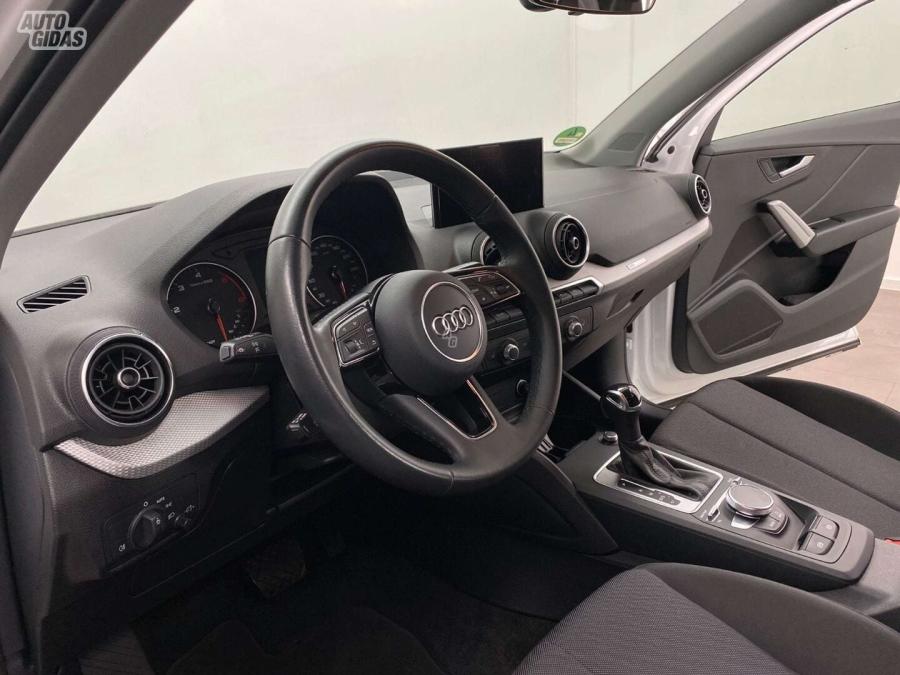 White Audi Q2 2023 in Kaunas, with an engine capacity of 2.00 L and mileage of 39 thousand km for 27878 €, photo 3 on AUTOMOTO.COM.LV