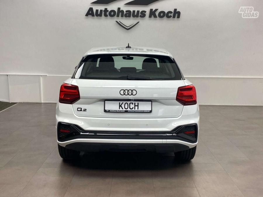 White Audi Q2 2023 in Kaunas, with an engine capacity of 2.00 L and mileage of 39 thousand km for 27878 €, photo 6 on AUTOMOTO.COM.LV