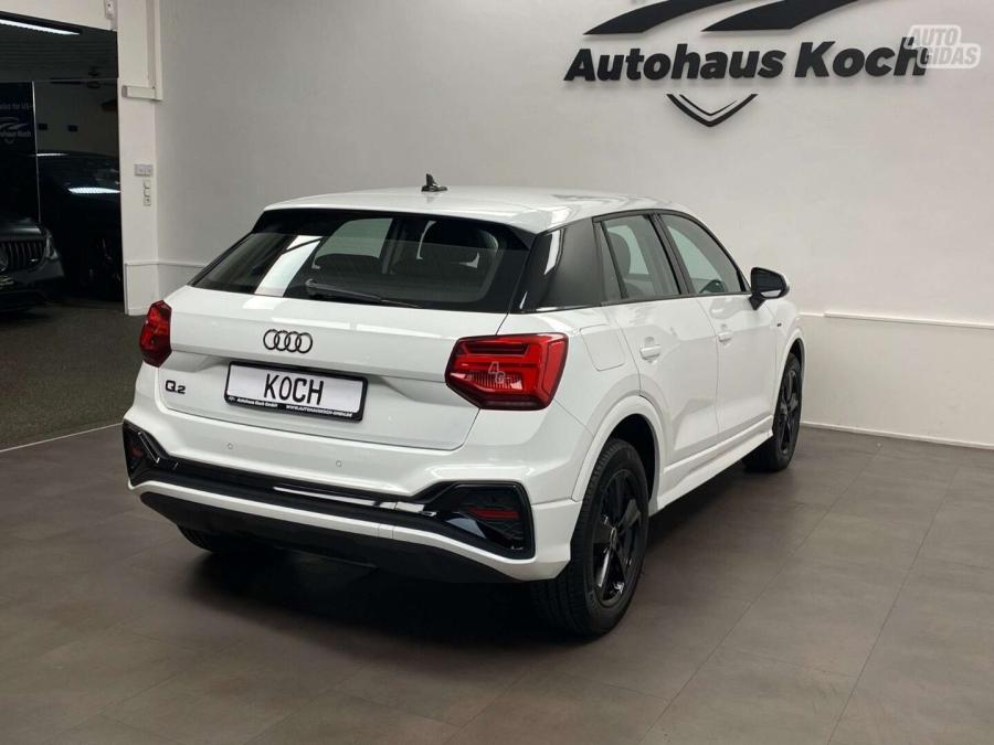 White Audi Q2 2023 in Kaunas, with an engine capacity of 2.00 L and mileage of 39 thousand km for 27878 €, photo 8 on AUTOMOTO.COM.LV