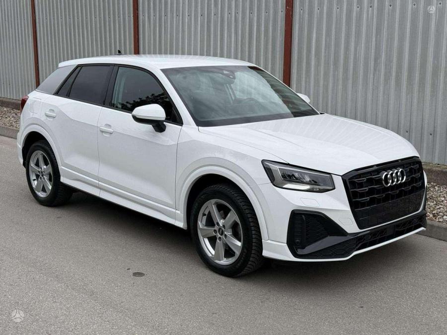 White Audi Q2 2023 in Vilkaviskis, with an engine capacity of 1.50 L and mileage of 81 thousand km for 19500 €, photo 1 on AUTOMOTO.COM.LV