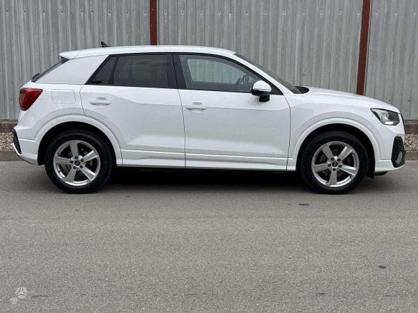 White Audi Q2 2023 in Vilkaviskis, with an engine capacity of 1.50 L and mileage of 81 thousand km for 19500 €, photo 3 on AUTOMOTO.COM.LV
