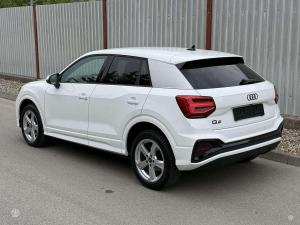 White Audi Q2 2023 in Vilkaviskis, with an engine capacity of 1.50 L and mileage of 81 thousand km for 19500 €, photo 7 on AUTOMOTO.COM.LV