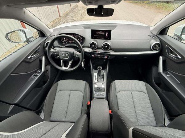 White Audi Q2 2023 in Vilkaviskis, with an engine capacity of 1.50 L and mileage of 81 thousand km for 19500 €, photo 11 on AUTOMOTO.COM.LV