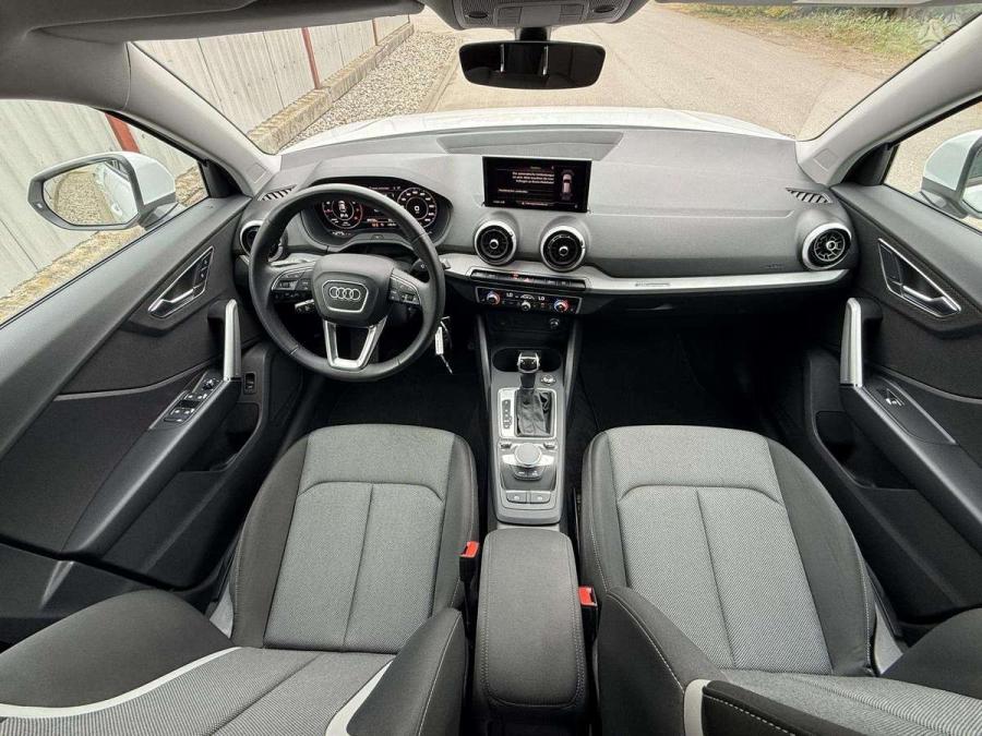White Audi Q2 2023 in Vilkaviskis, with an engine capacity of 1.50 L and mileage of 81 thousand km for 19500 €, photo 11 on AUTOMOTO.COM.LV