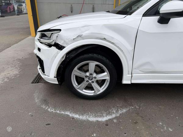 White Audi Q2 2017 in Kaunas, with an engine capacity of 1.40 L and mileage of 104 thousand km for 7150 €, photo 3 on AUTOMOTO.COM.LV