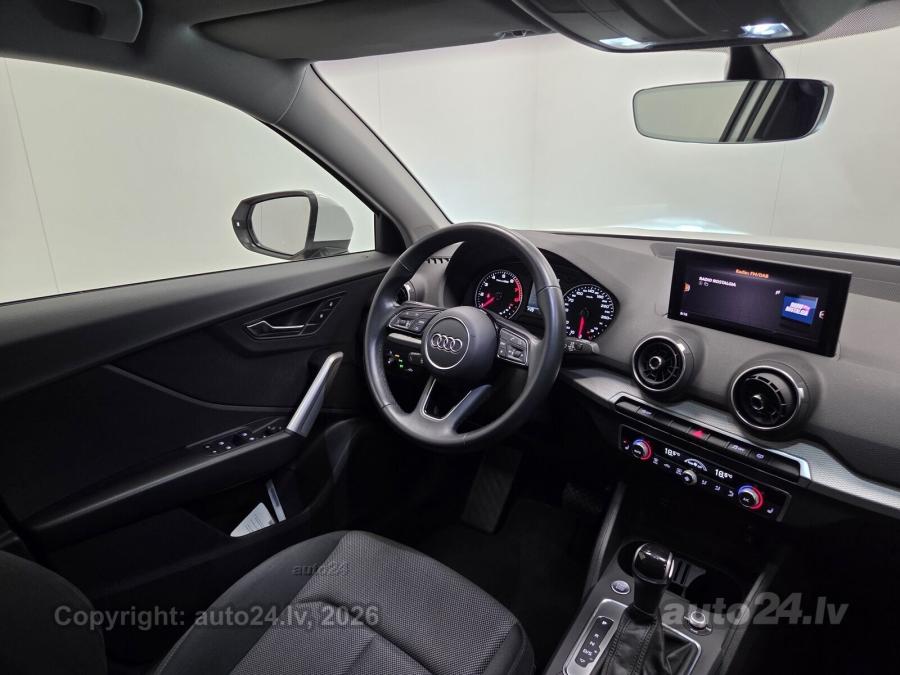 White Audi Q2 2021 in Tallinn, with an engine capacity of 1.50 L and mileage of 66 thousand km for 19900 €, photo 14 on AUTOMOTO.COM.LV