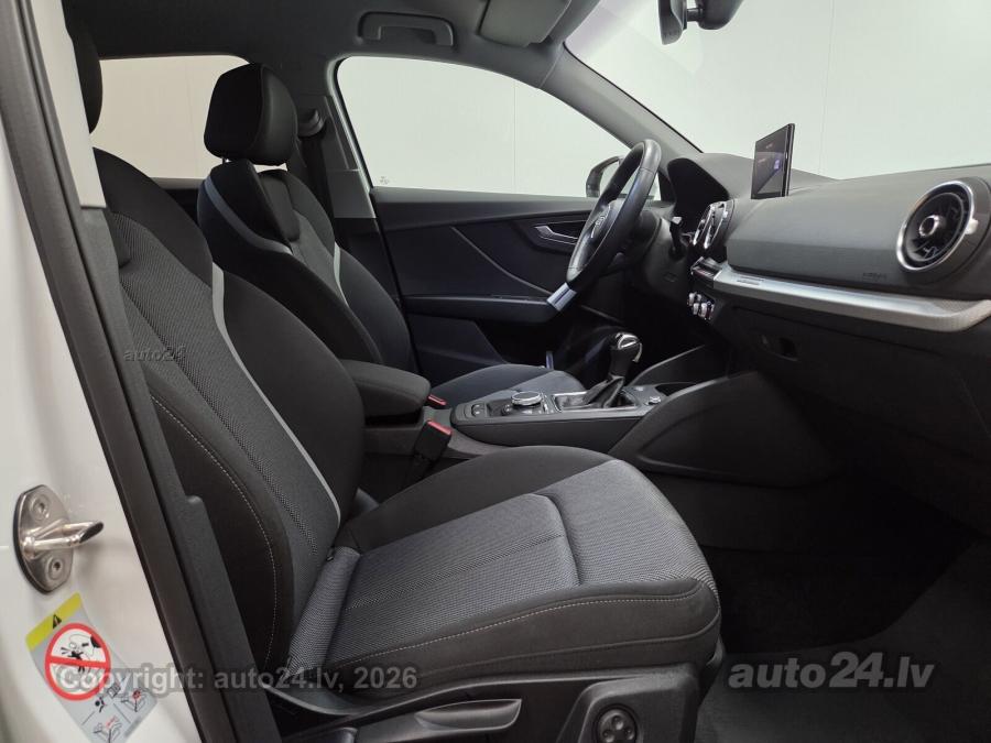 White Audi Q2 2021 in Tallinn, with an engine capacity of 1.50 L and mileage of 66 thousand km for 19900 €, photo 18 on AUTOMOTO.COM.LV