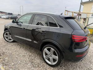 Black Audi Q3 2013 in Vilnius, with an engine capacity of 1.97 L and mileage of 228 thousand km for 12900 €, photo 5 on AUTOMOTO.COM.LV