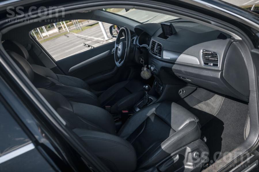 Black Audi Q3 2015 in Riga, with an engine capacity of 2.00 L and mileage of 260 thousand km for 12600 €, photo 9 on AUTOMOTO.COM.LV
