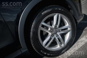 Black Audi Q3 2015 in Riga, with an engine capacity of 2.00 L and mileage of 260 thousand km for 12600 €, photo 16 on AUTOMOTO.COM.LV
