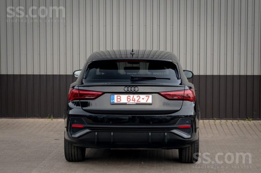 Black Audi Q3 2022 in Talsi, with an engine capacity of 1.40 L and mileage of 184 thousand km for 25990 €, photo 6 on AUTOMOTO.COM.LV