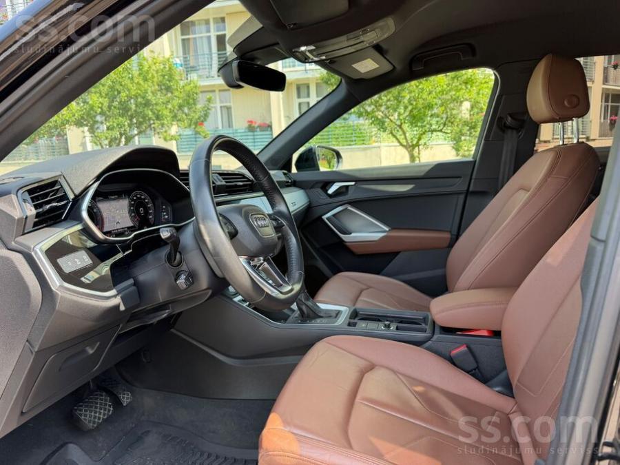 Black Audi Q3 2019 in Riga, with an engine capacity of 2.00 L and mileage of 102 thousand km for 23990 €, photo 14 on AUTOMOTO.COM.LV