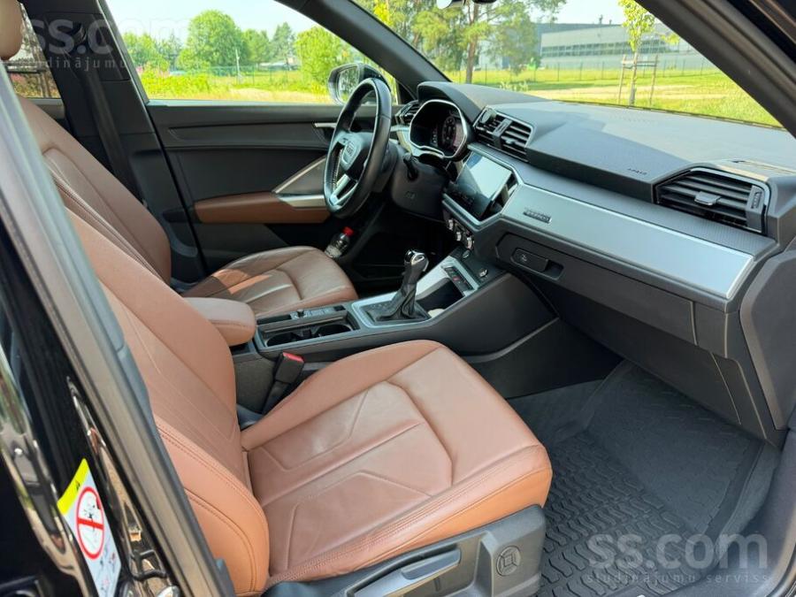 Black Audi Q3 2019 in Riga, with an engine capacity of 2.00 L and mileage of 102 thousand km for 23990 €, photo 15 on AUTOMOTO.COM.LV