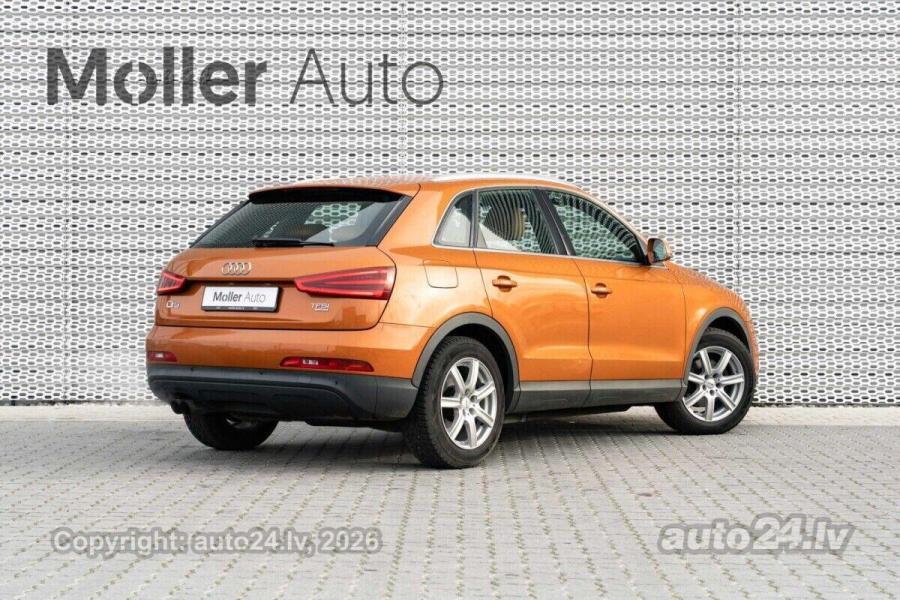 Orange Audi Q3 2012 in Riga, with an engine capacity of 2.00 L and mileage of 222 thousand km for 10490 €, photo 4 on AUTOMOTO.COM.LV