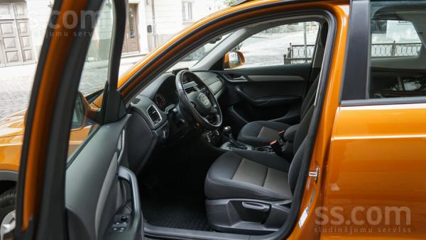 Orange Audi Q3 2013 in Riga, with an engine capacity of 2.00 L and mileage of 150 thousand km for 12950 €, photo 7 on AUTOMOTO.COM.LV