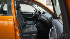 Orange Audi Q3 2013 in Riga, with an engine capacity of 2.00 L and mileage of 150 thousand km for 12950 €, photo 11 on AUTOMOTO.COM.LV
