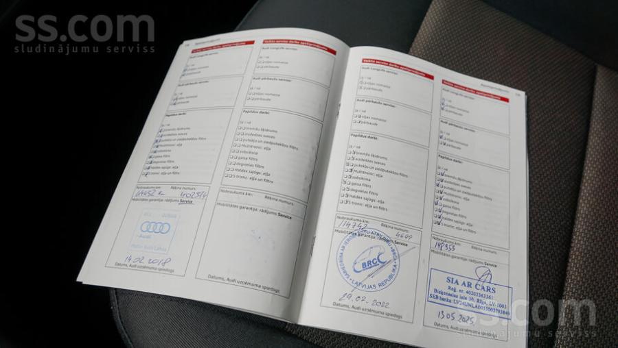 Orange Audi Q3 2013 in Riga, with an engine capacity of 2.00 L and mileage of 150 thousand km for 12950 €, photo 16 on AUTOMOTO.COM.LV