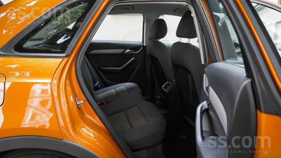 Orange Audi Q3 2013 in Riga, with an engine capacity of 2.00 L and mileage of 150 thousand km for 12950 €, photo 10 on AUTOMOTO.COM.LV