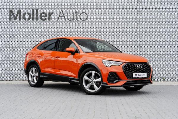 Orange Audi Q3 2023 in Marupe, with an engine capacity of 2.00 L and mileage of 69 thousand km for 32900 €, photo 2 on AUTOMOTO.COM.LV