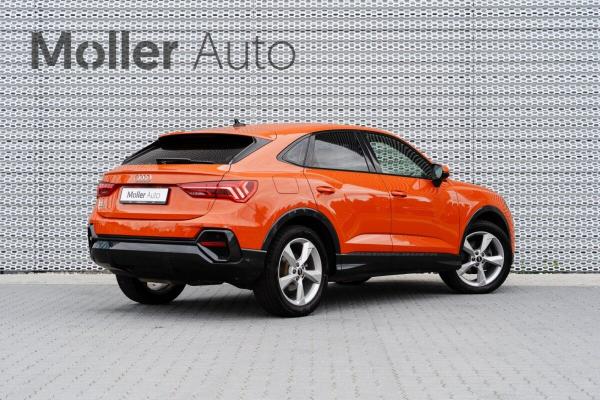 Orange Audi Q3 2023 in Marupe, with an engine capacity of 2.00 L and mileage of 69 thousand km for 32900 €, photo 4 on AUTOMOTO.COM.LV