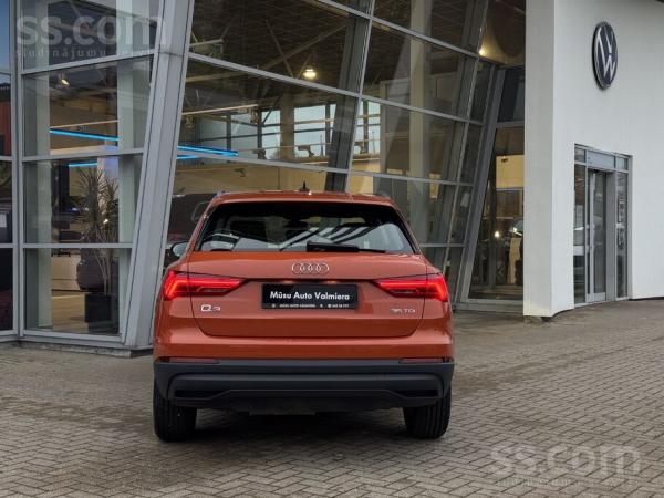 Orange Audi Q3 2023 in Valmiera, with an engine capacity of 2.00 L and mileage of 137 thousand km for 19500 €, photo 6 on AUTOMOTO.COM.LV