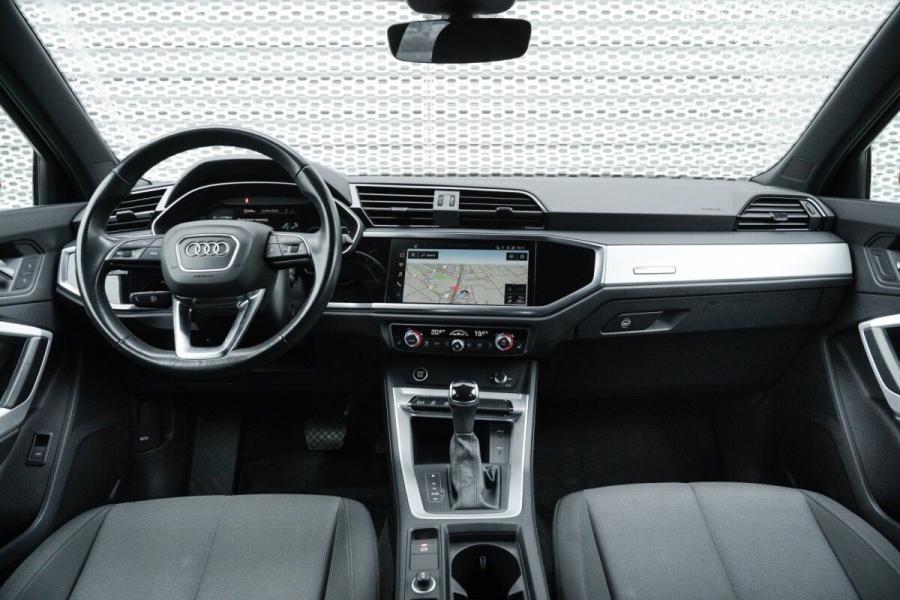 Orange Audi Q3 2023 in Marupe, with an engine capacity of 1.50 L and mileage of 70 thousand km for 27900 €, photo 7 on AUTOMOTO.COM.LV