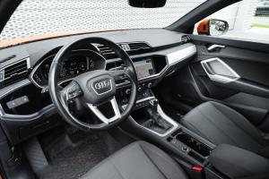 Orange Audi Q3 2023 in Marupe, with an engine capacity of 1.50 L and mileage of 70 thousand km for 27900 €, photo 10 on AUTOMOTO.COM.LV