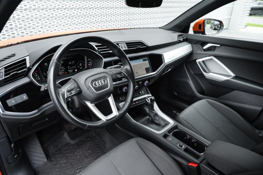 Orange Audi Q3 2023 in Marupe, with an engine capacity of 1.50 L and mileage of 70 thousand km for 27900 €, photo 10 on AUTOMOTO.COM.LV