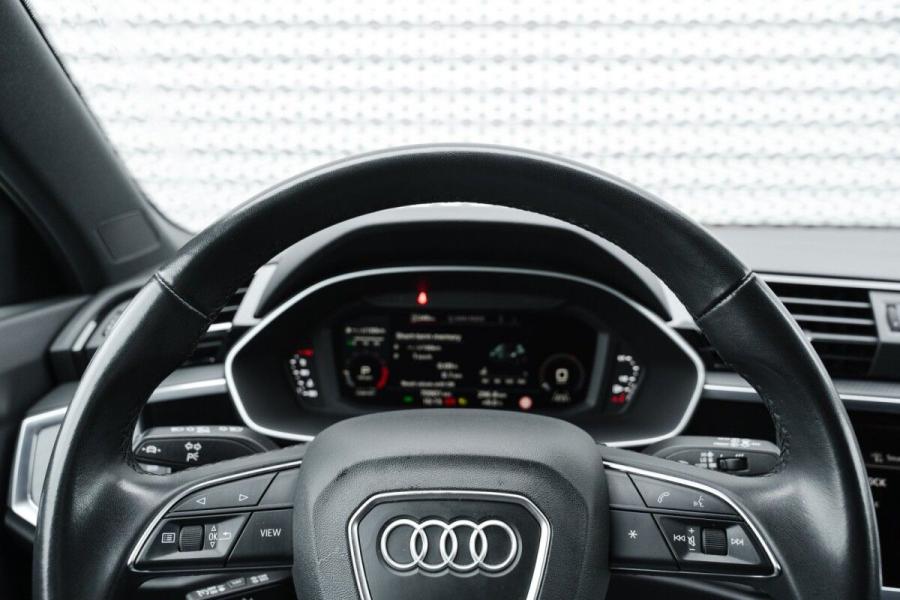 Orange Audi Q3 2023 in Marupe, with an engine capacity of 1.50 L and mileage of 70 thousand km for 27900 €, photo 17 on AUTOMOTO.COM.LV