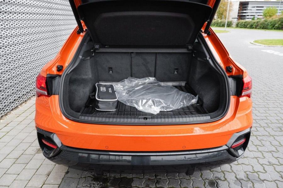 Orange Audi Q3 2023 in Marupe, with an engine capacity of 1.50 L and mileage of 70 thousand km for 27900 €, photo 27 on AUTOMOTO.COM.LV