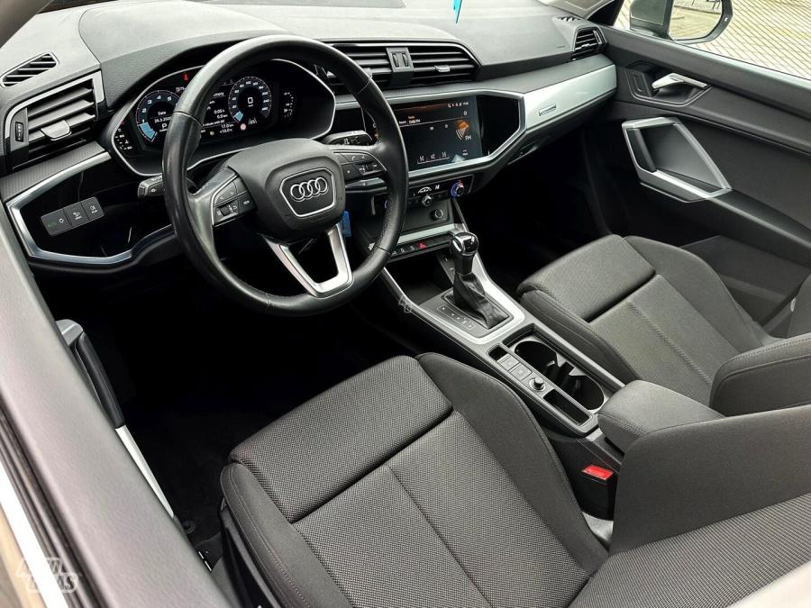Grey Audi Q3 Sportback 2022 in Kaunas, with an engine capacity of 1.50 L and mileage of 193 thousand km for 22900 €, photo 6 on AUTOMOTO.COM.LV