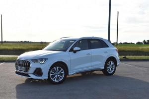 White Audi Q3 2019 in Taurage, with an engine capacity of 1.97 L and mileage of 190 thousand km for 19500 €, photo 7 on AUTOMOTO.COM.LV