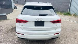 White Audi Q3 2021 in Ukmerge, with an engine capacity of 1.98 L and mileage of 95 thousand km for 8499 €, photo 3 on AUTOMOTO.COM.LV