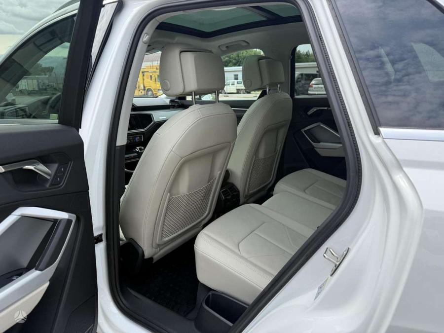 White Audi Q3 2023 in Siauliai, with an engine capacity of 2.00 L and mileage of 61 thousand km for 20449 €, photo 9 on AUTOMOTO.COM.LV