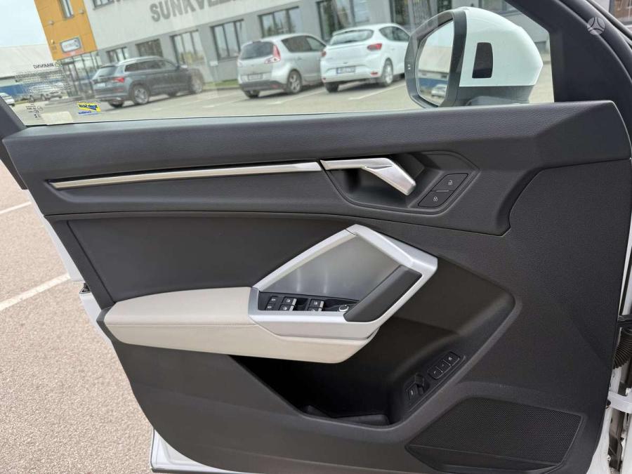 White Audi Q3 2023 in Siauliai, with an engine capacity of 2.00 L and mileage of 61 thousand km for 20449 €, photo 11 on AUTOMOTO.COM.LV
