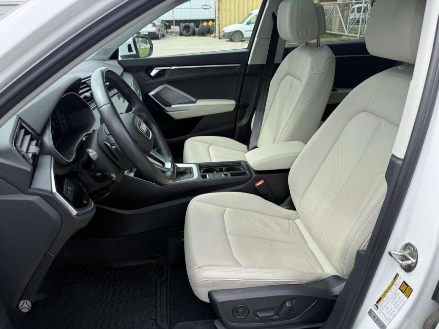 White Audi Q3 2023 in Siauliai, with an engine capacity of 2.00 L and mileage of 61 thousand km for 20449 €, photo 12 on AUTOMOTO.COM.LV