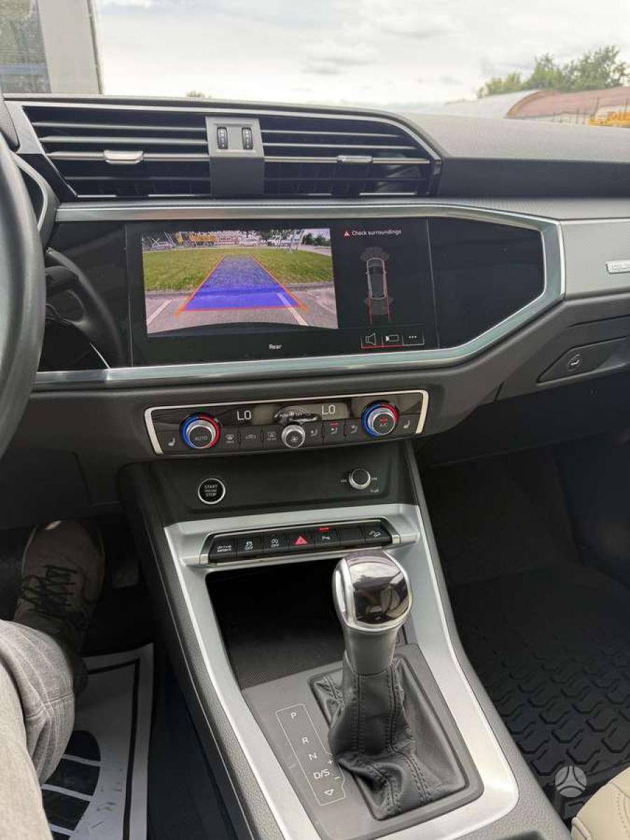 White Audi Q3 2023 in Siauliai, with an engine capacity of 2.00 L and mileage of 61 thousand km for 20449 €, photo 15 on AUTOMOTO.COM.LV