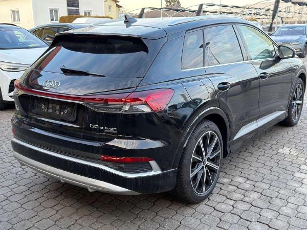 Black Audi Q4 e-tron 2023 in Marijampole, with an engine capacity of 0.00 L and mileage of 97 thousand km for 29950 €, photo 4 on AUTOMOTO.COM.LV