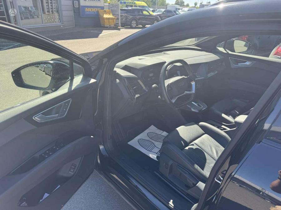 Black Audi Q4 e-tron 2023 in Kaunas, with an engine capacity of 0.00 L and mileage of 59 thousand km for 32500 €, photo 9 on AUTOMOTO.COM.LV