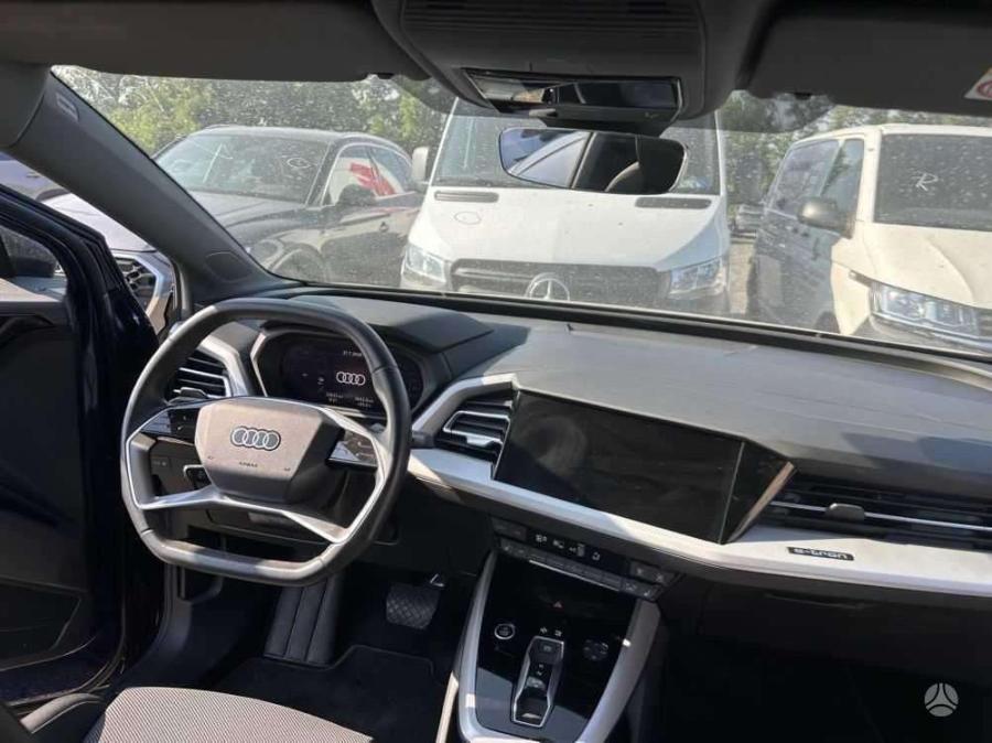 Blue Audi Q4 e-tron 2024 in Panevezys, with an engine capacity of 0.00 L and mileage of 23 thousand km for 37900 €, photo 4 on AUTOMOTO.COM.LV