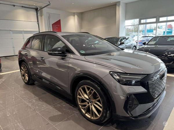 Pelēks Audi Q4 e-tron 2022 Viļņa, ar dzinēja tilpumu 0.00 L un nobraukumu 98 tūkst. km par 30989 €, foto 2 vietnē AUTOMOTO.COM.LV
