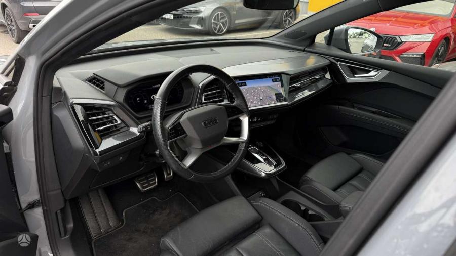 Grey Audi Q4 e-tron 2022 in Vilnius, with an engine capacity of 0.00 L and mileage of 63 thousand km for 32888 €, photo 10 on AUTOMOTO.COM.LV