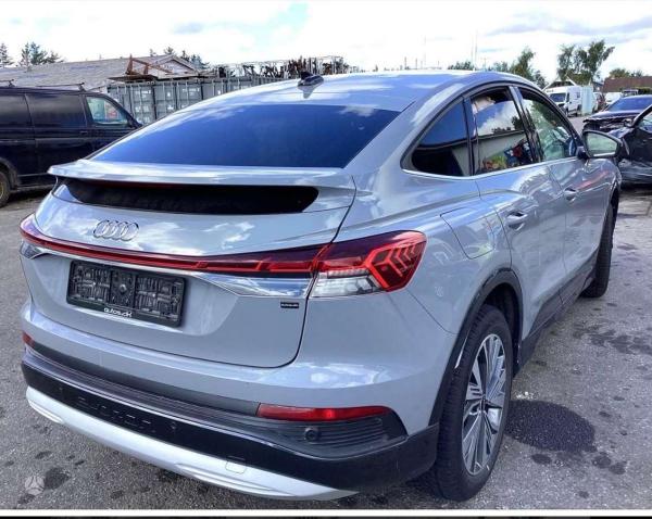 Grey Audi Q4 e-tron 2022 in Kaunas, with an engine capacity of 0.00 L and mileage of 37 thousand km for 18300 €, photo 4 on AUTOMOTO.COM.LV