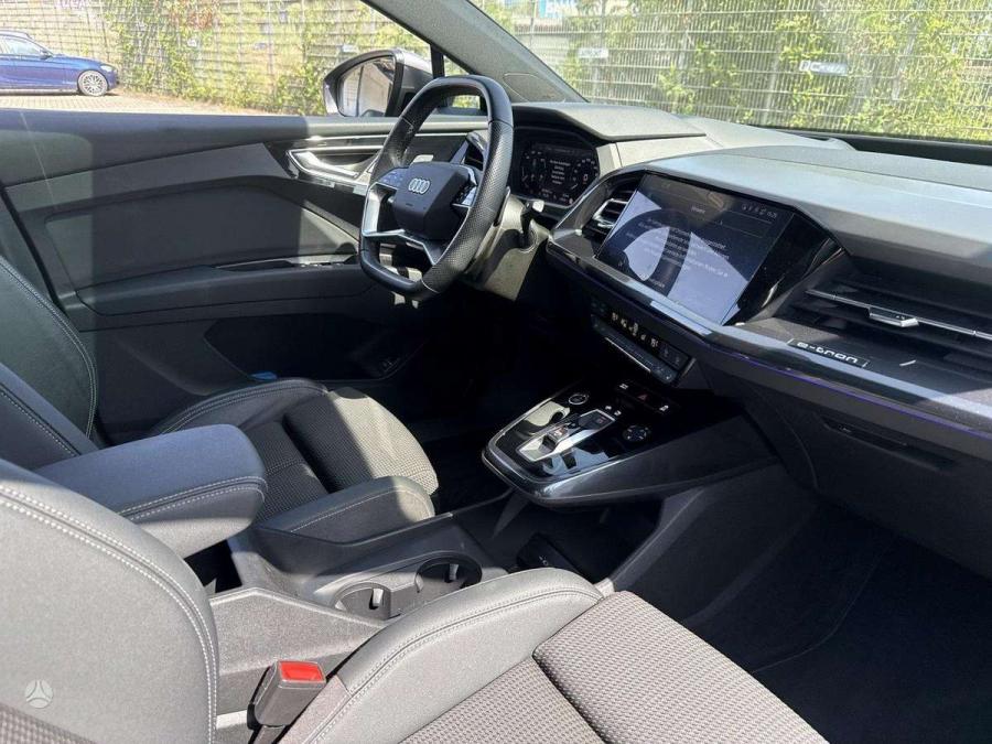 Grey Audi Q4 e-tron 2023 in Vilnius, with an engine capacity of 0.00 L and mileage of 108 thousand km for 35555 €, photo 29 on AUTOMOTO.COM.LV